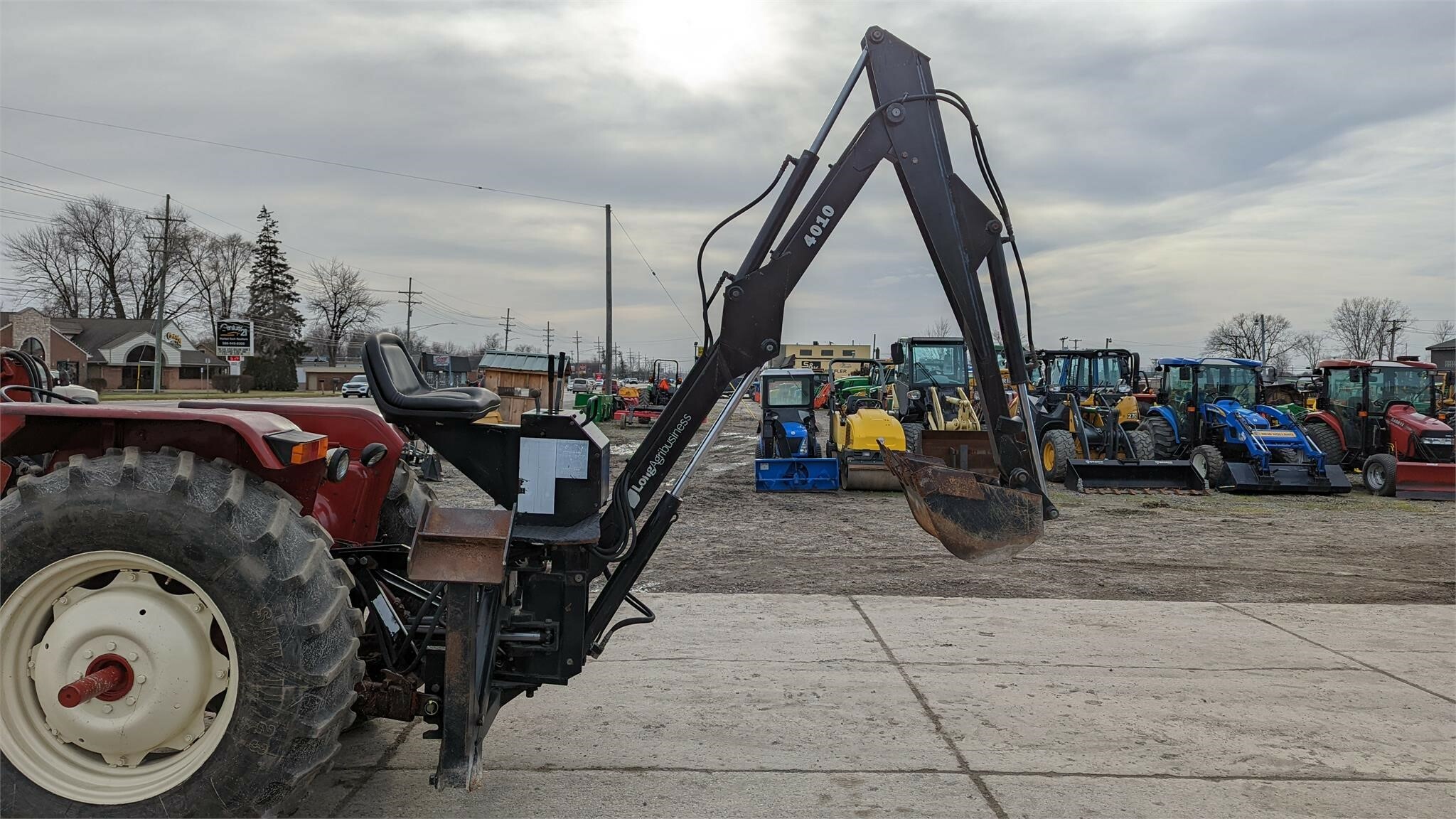 Long 4010 Backhoe and Excavator Attachment - $7,500 | Machinery Pete