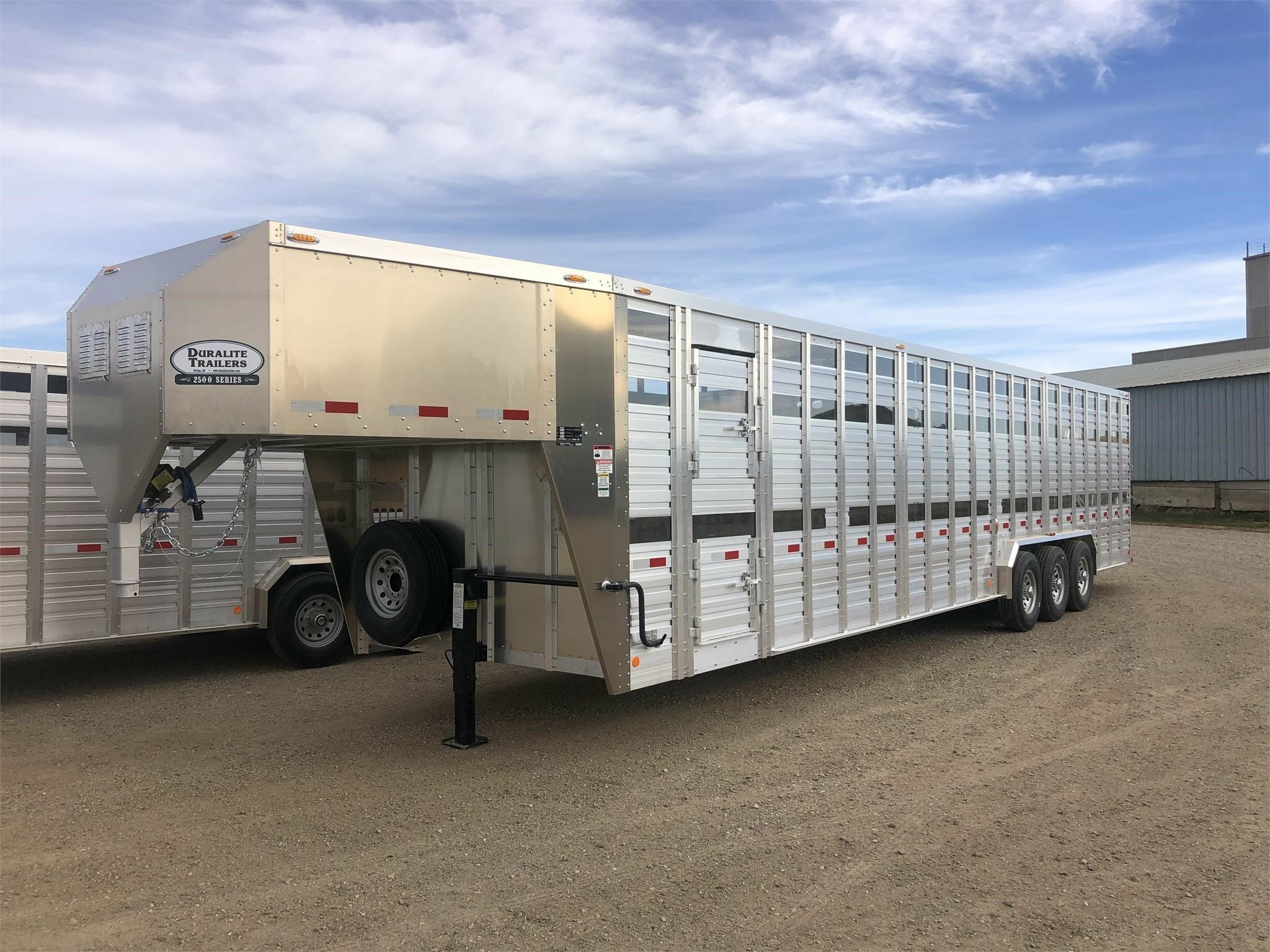 2025 DuraLite 2500 Pig Special Livestock Trailer - $Call | Machinery Pete
