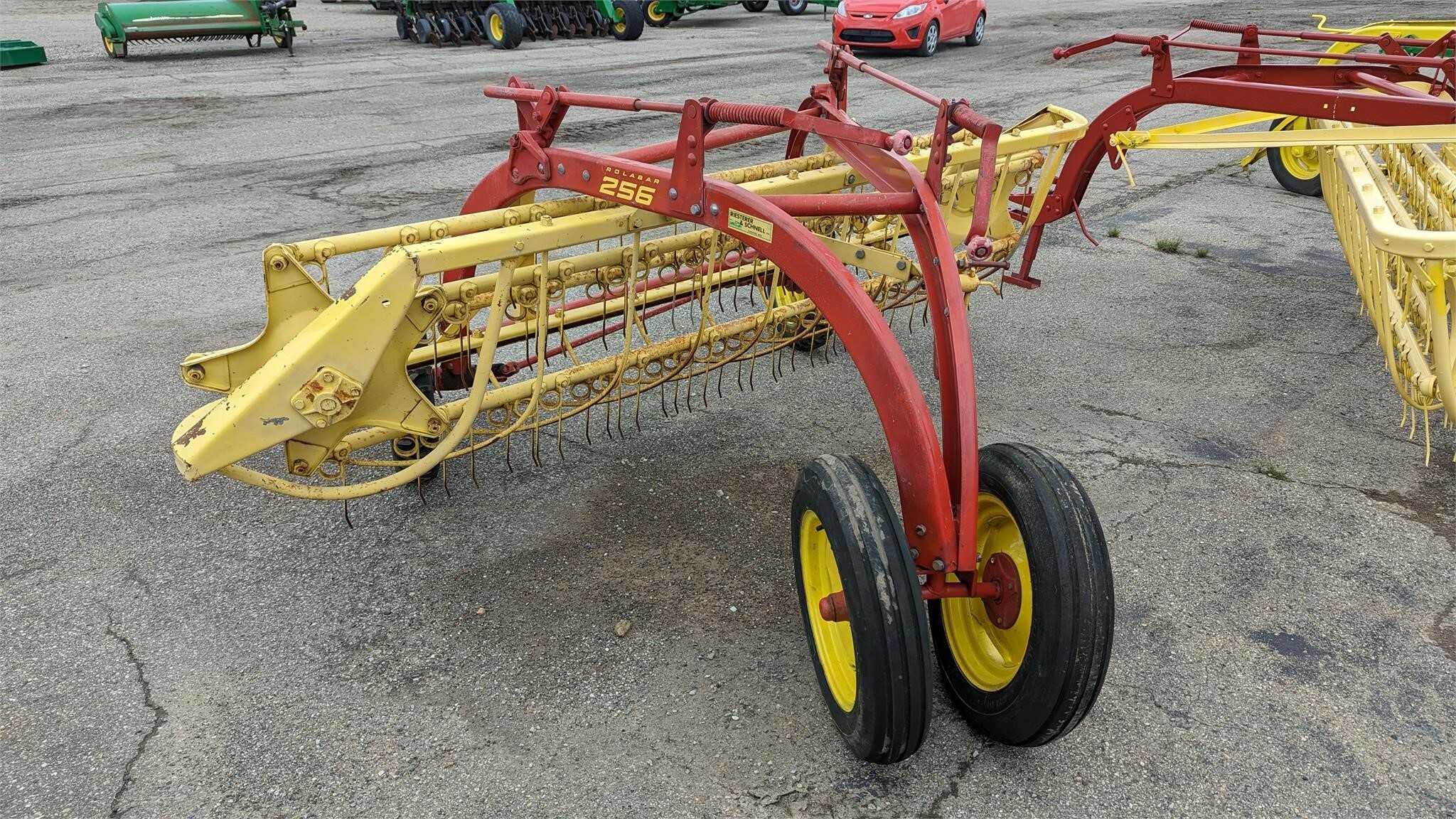 New Holland Rolabar 256 Rake - $5,000 | Machinery Pete