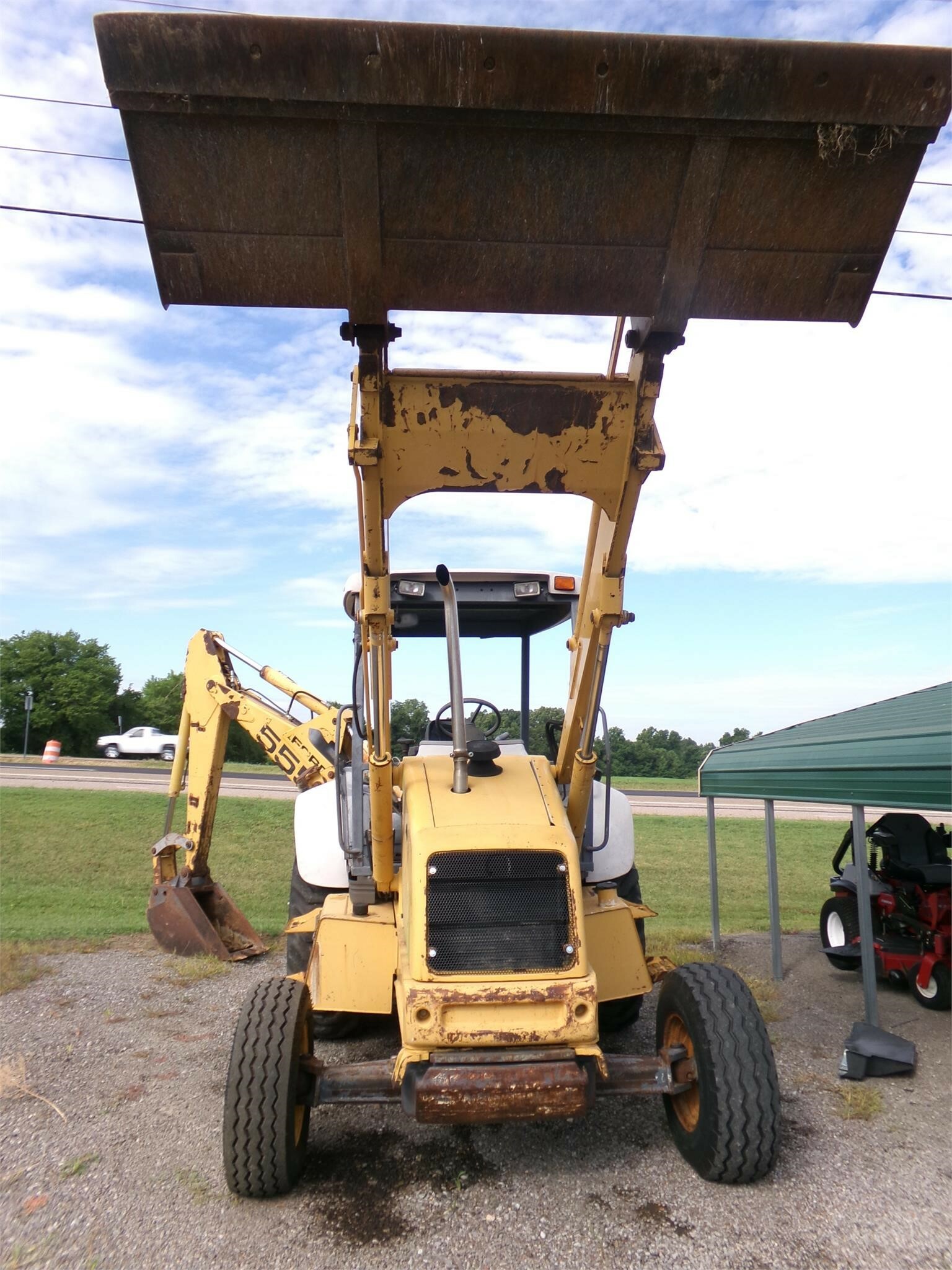 1998 New Holland 555E Backhoe - $18,500 | Machinery Pete