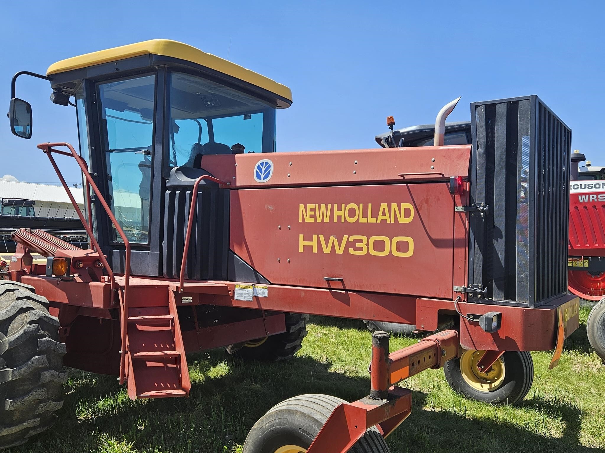 2001 New Holland HW300 Self-Propelled Windrowers and Swather - $31,500 ...